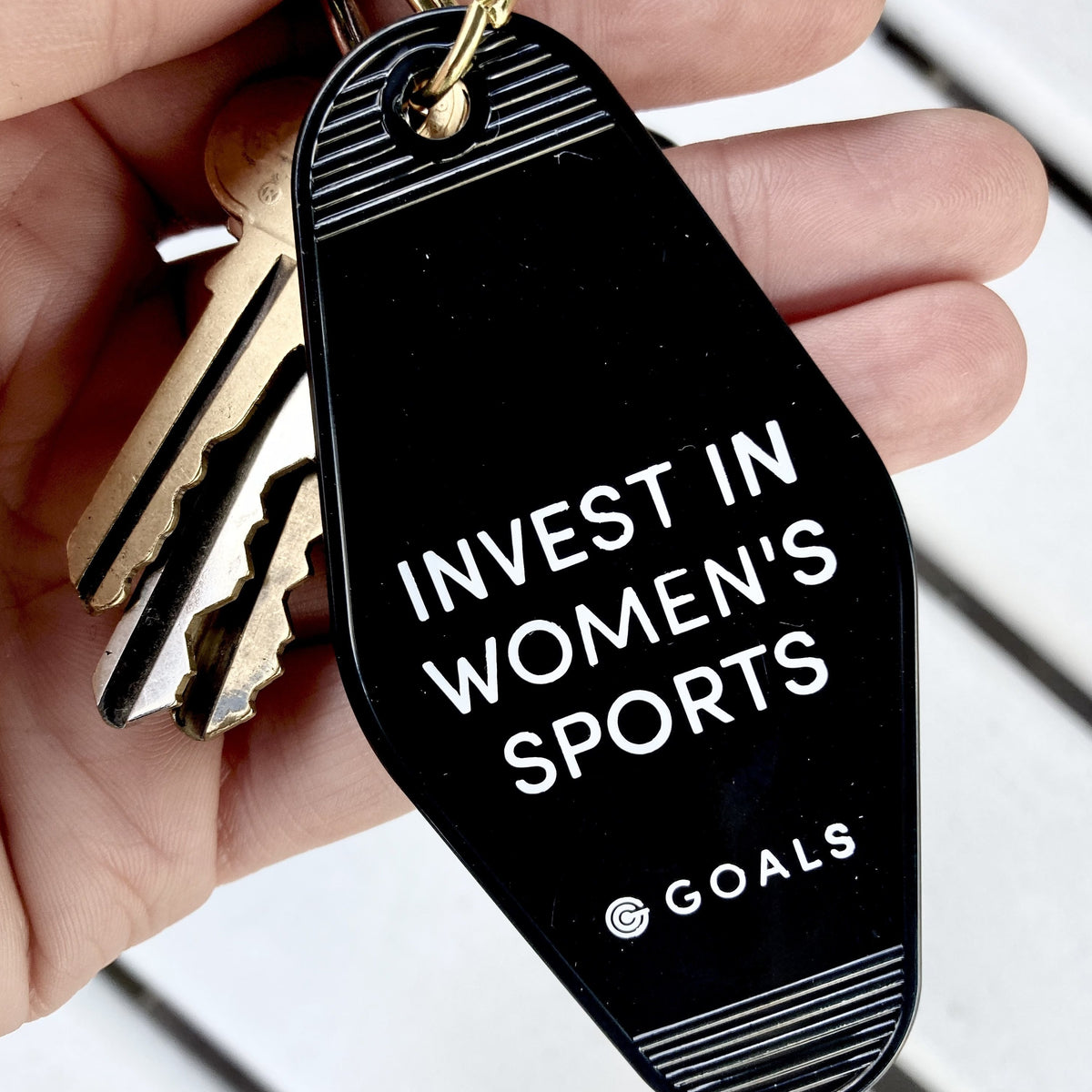 "Invest In Women's Sports" Motel Keychain – GOALS | Women's Sports